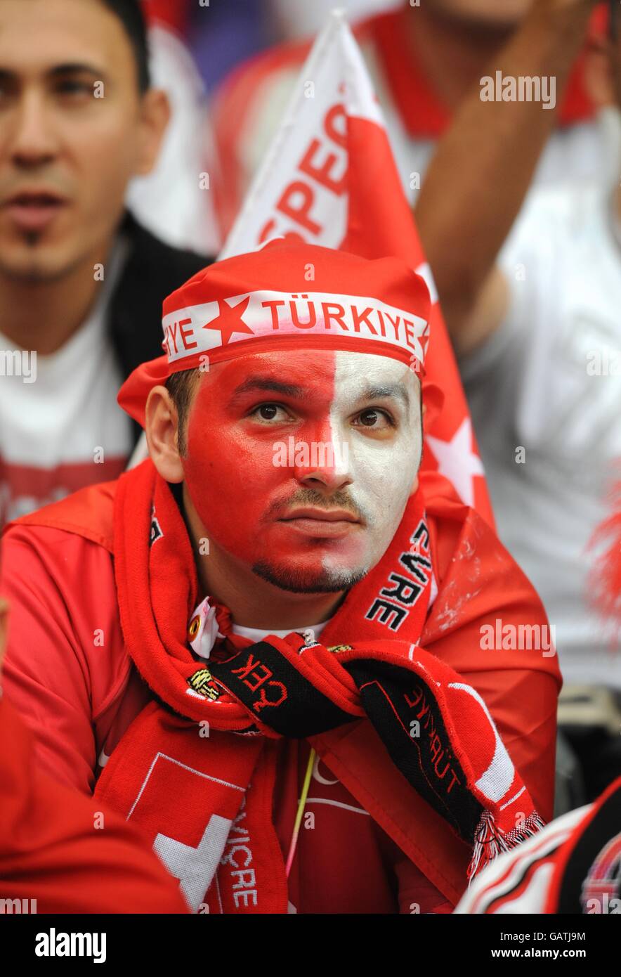 A Turkish fan shows his support and colours in the stands prior to kick ...