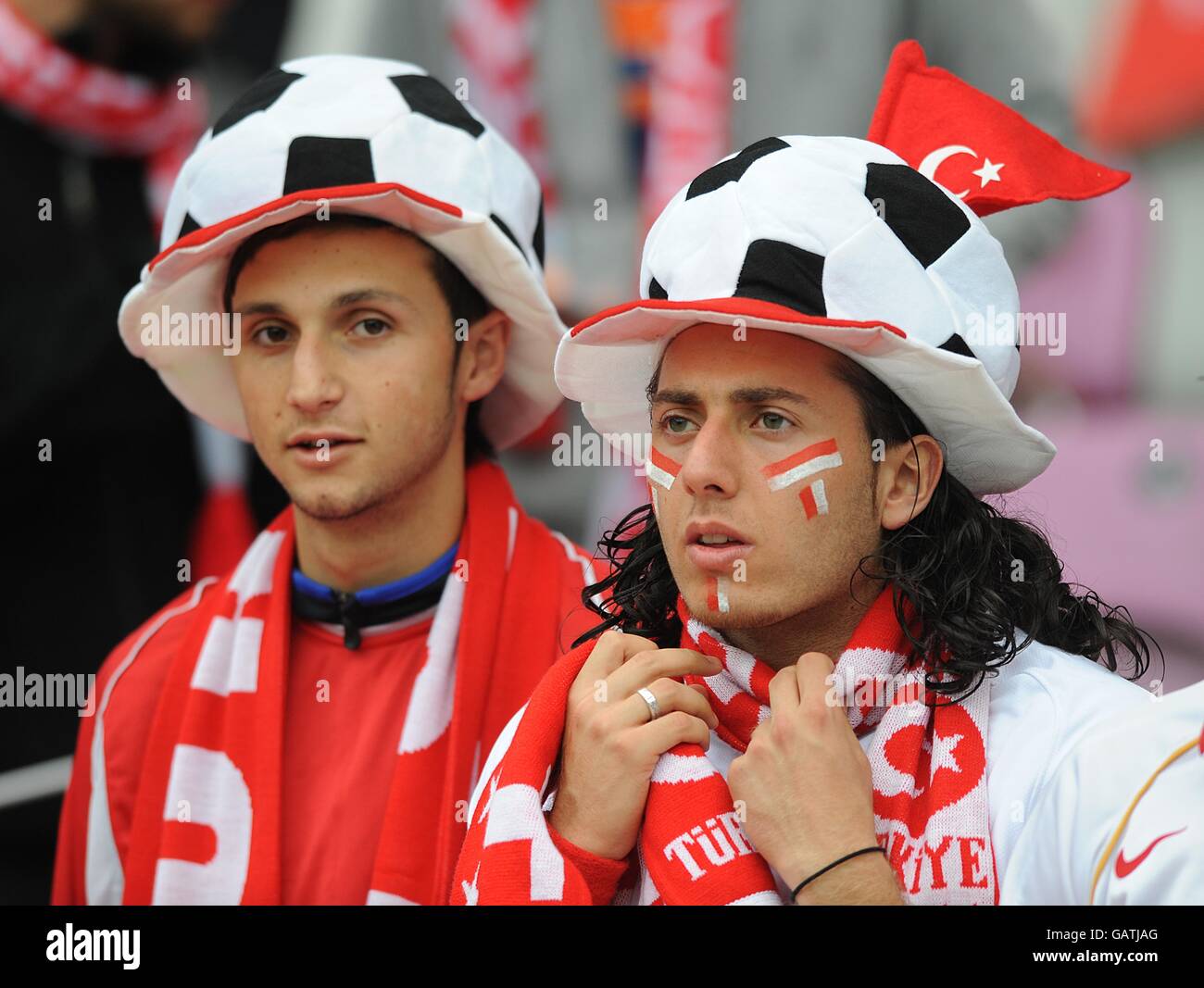 Two Turkish fans show their support and colours in the stands prior to ...