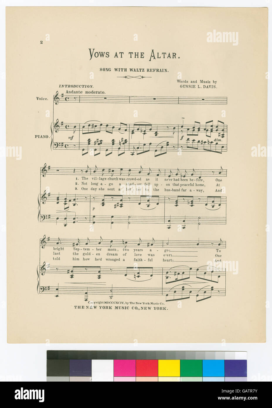 A moment of commitment captured at the altar during a wedding ceremony ...