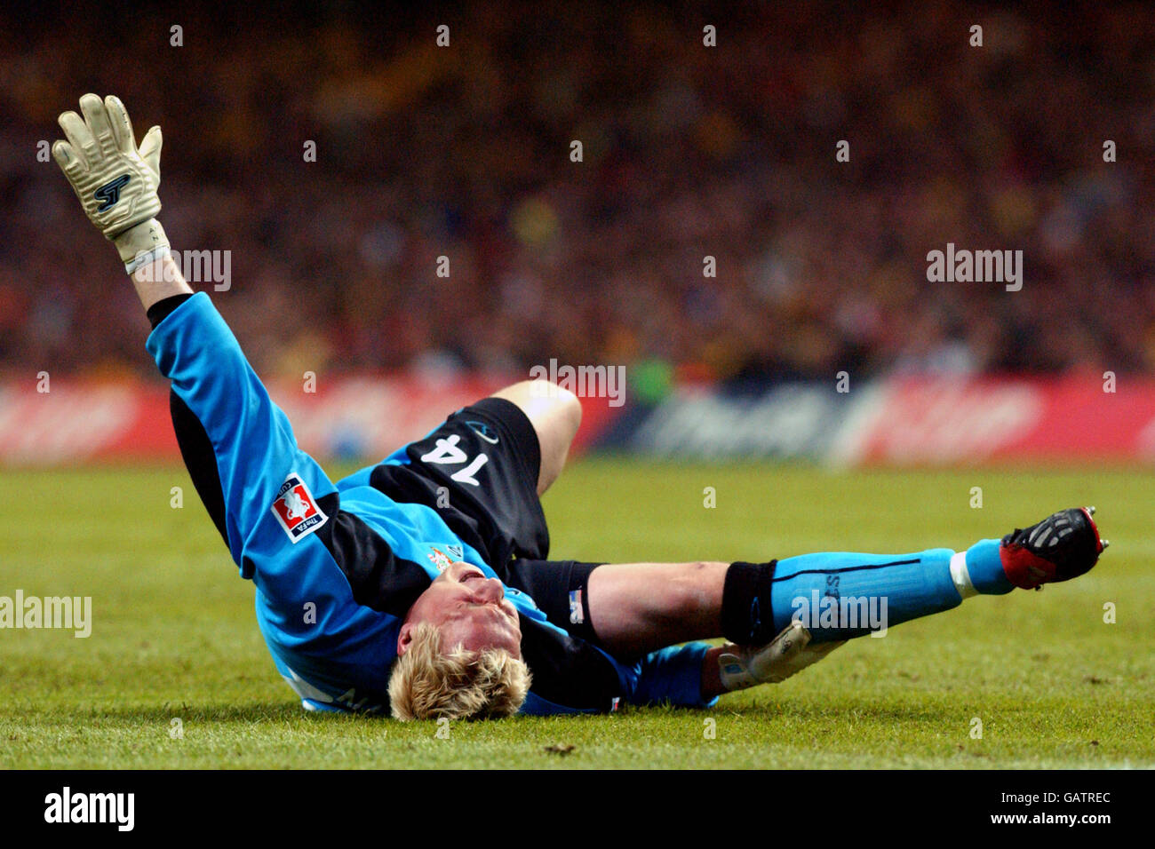 Southampton's goalkeeper Antti Niemi goes down in pain injured during ...