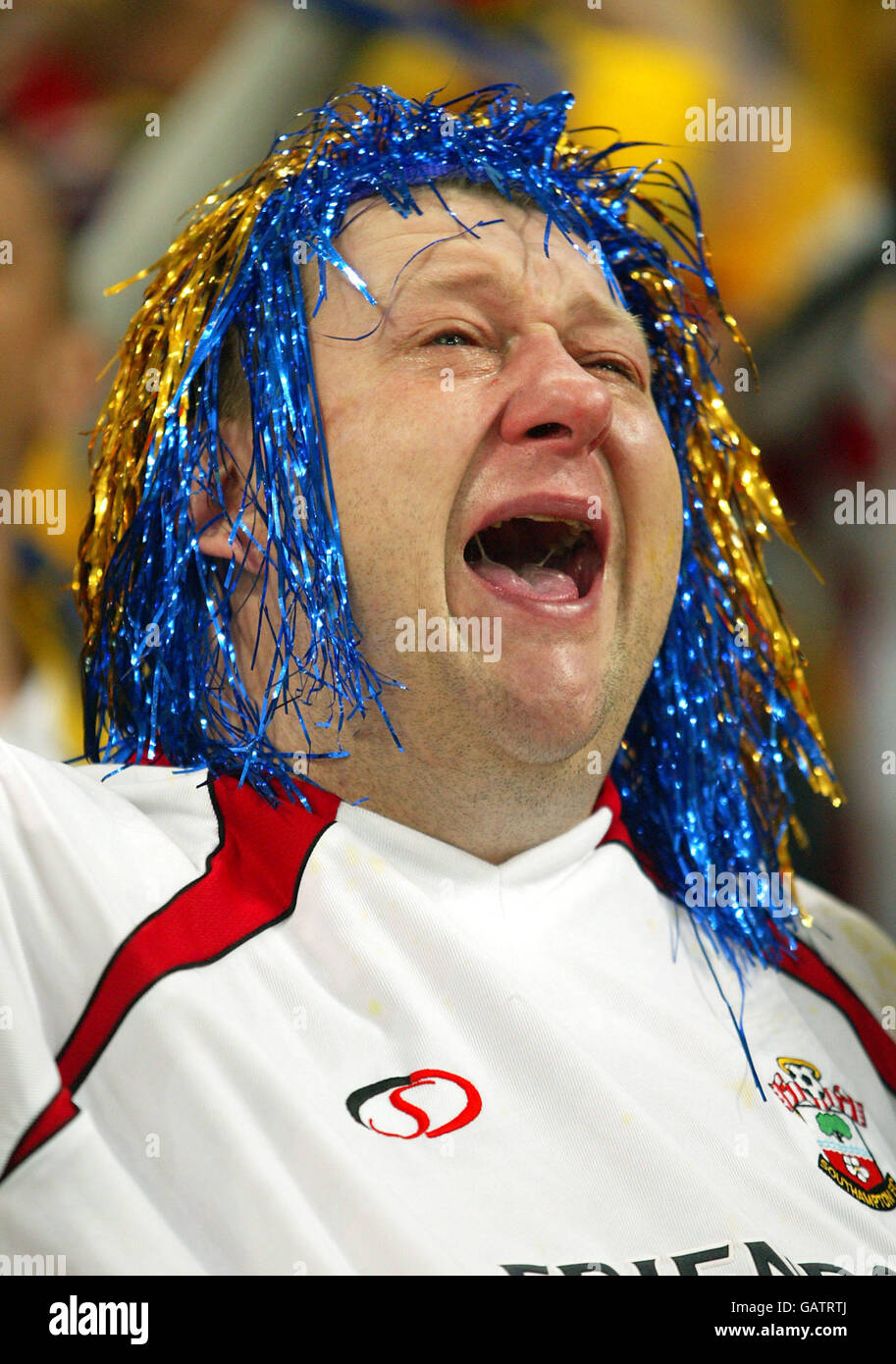 A Southampton fan in tears at the final whistle after his side lost ...