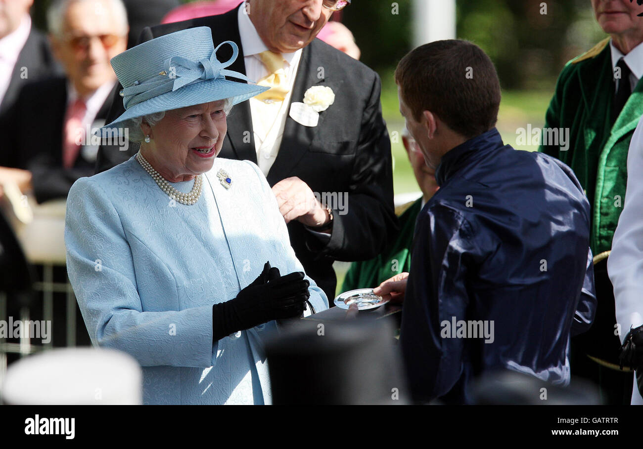 Great Britain's Queen Elizabeth II presents Johnny Murtagh with his ...