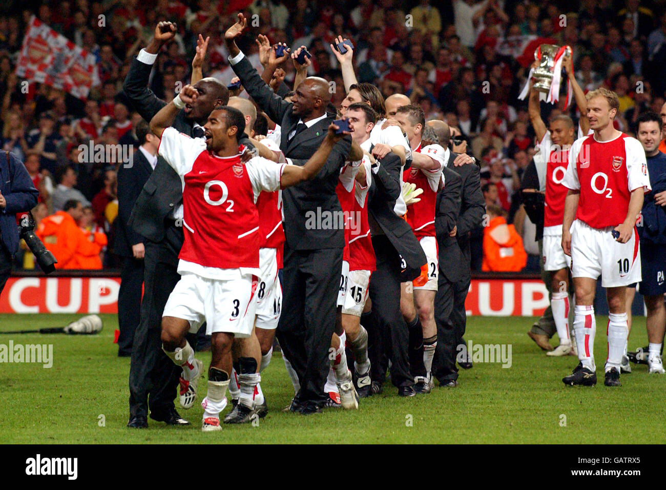 Football celebrations patrick vieira dennis bergkamp hi-res stock ...