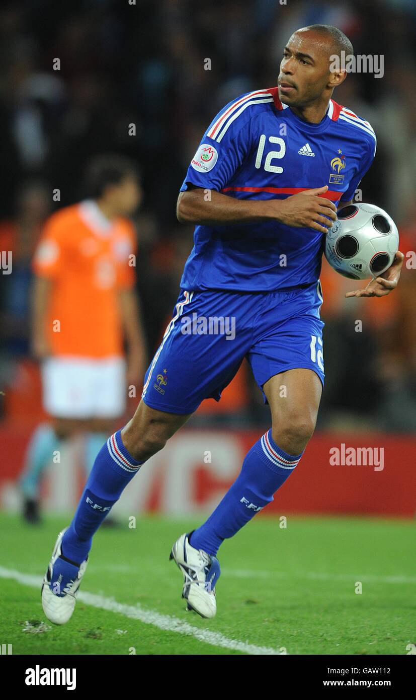 France's Thierry Henry celebrates after scoring their first goal Stock ...
