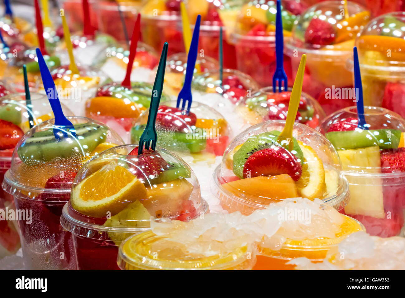 Fresh Fruit cocktail salad in plastic cups on a market stall Stock ...