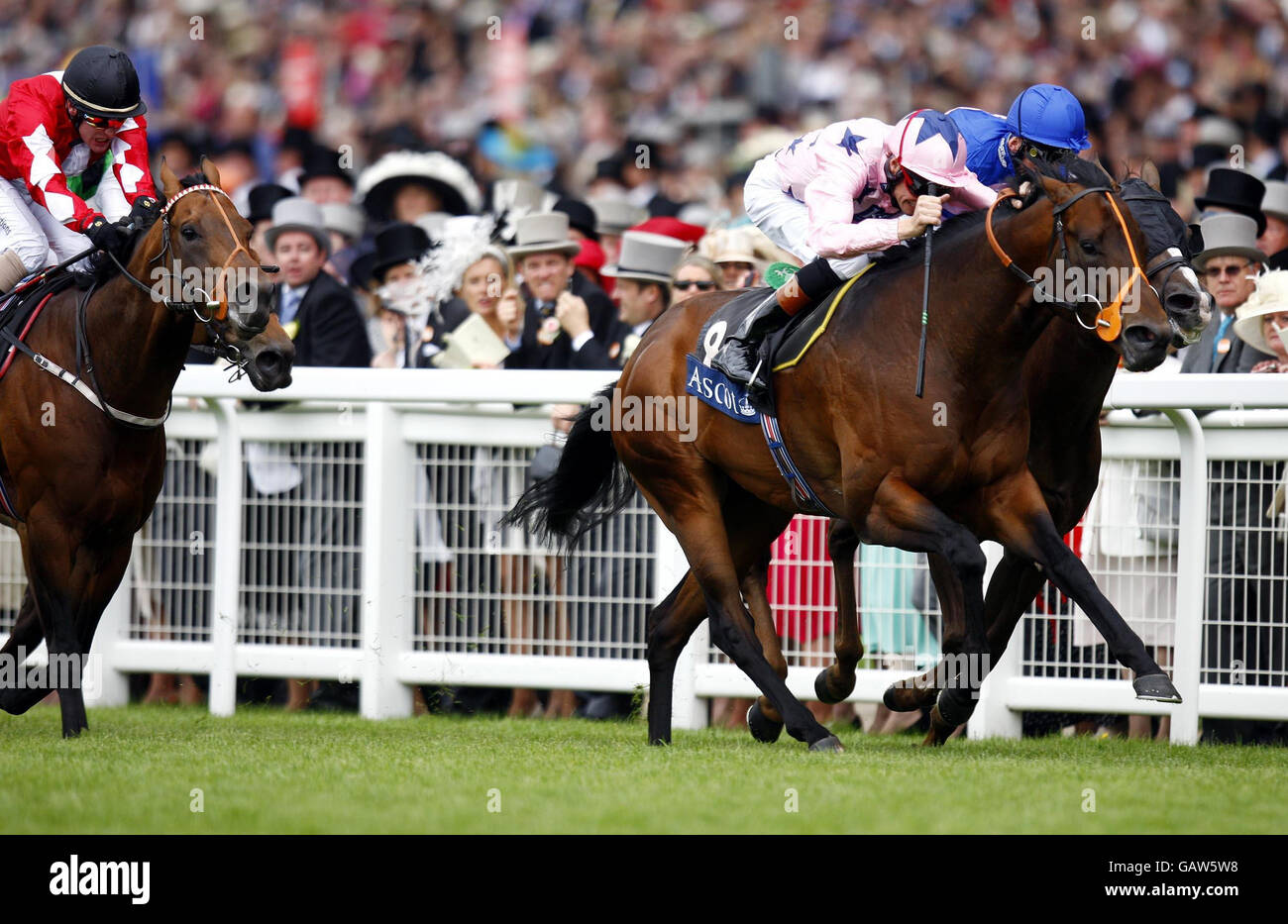 Mr aviator ridden by jockey richard hughes in the pink hi-res stock ...