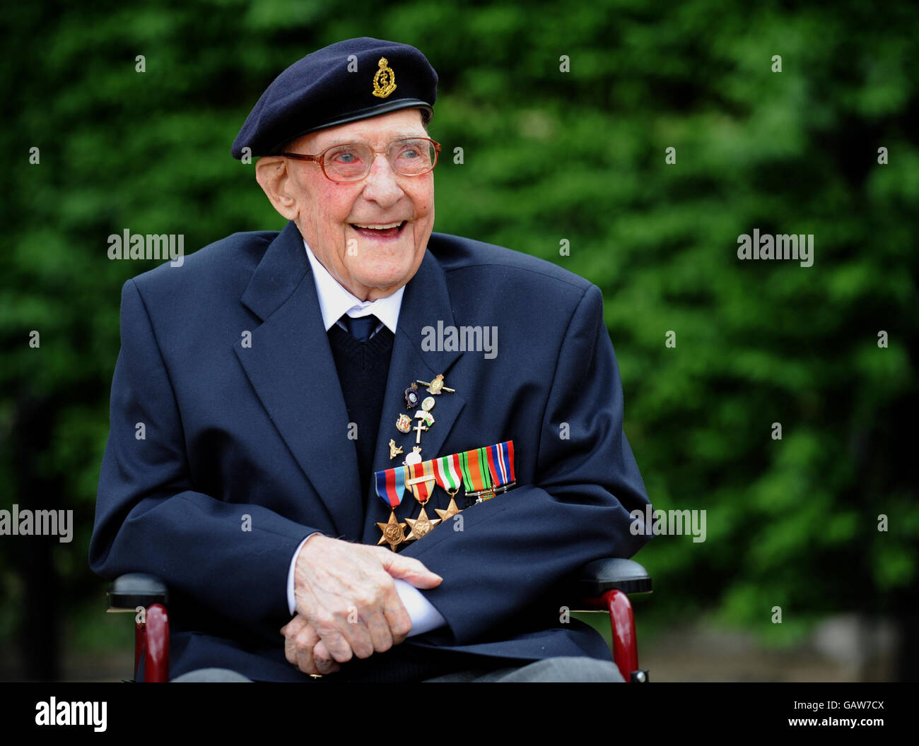TA veteran Edwin Cooper, 104, poses for the media before the ...