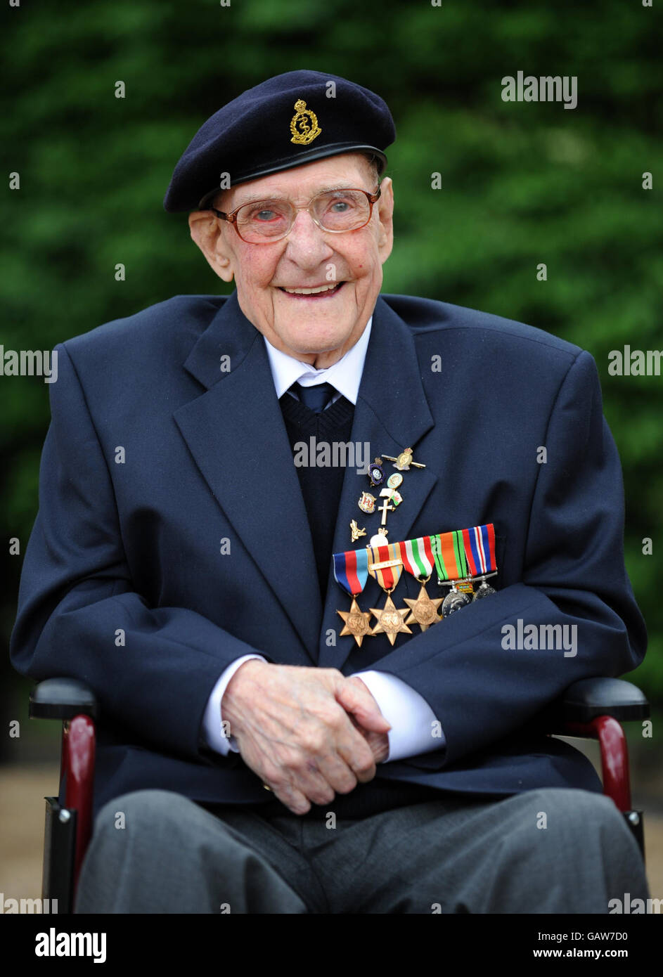 TA veteran Edwin Cooper, 104, poses for the media before the ...