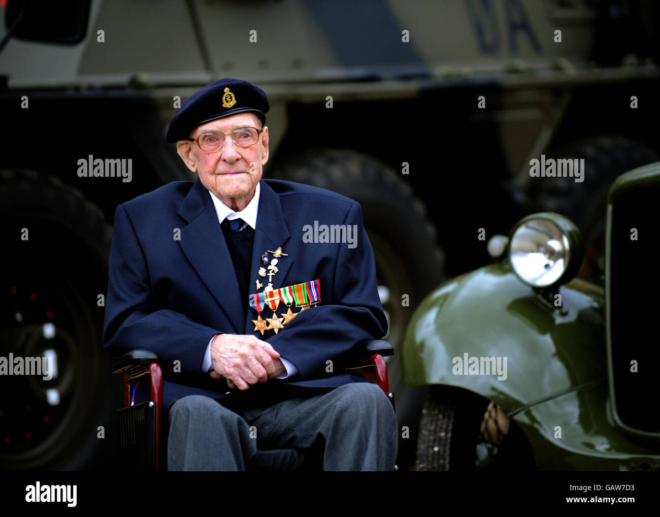 TA veteran Edwin Cooper, 104, poses for the media before the ...