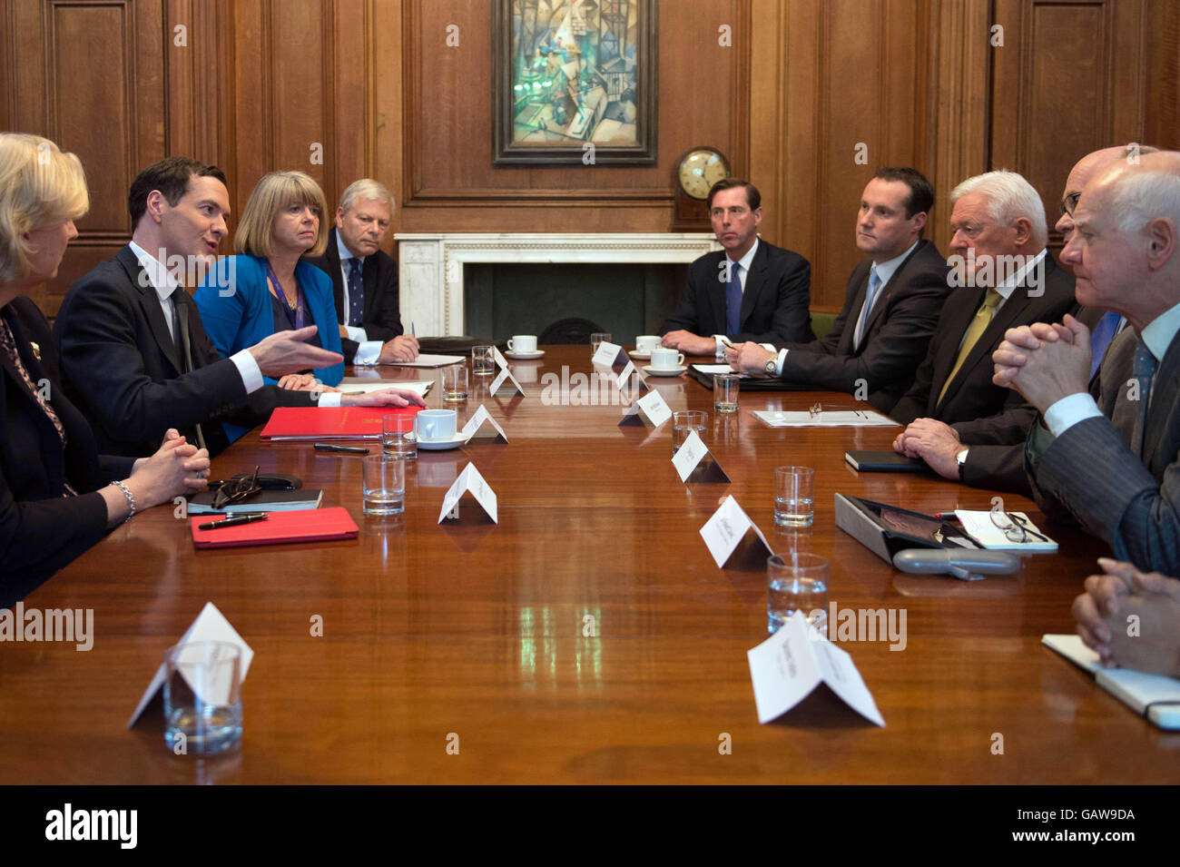 Chancellor George Osborne (second left) holds a meeting with senior ...