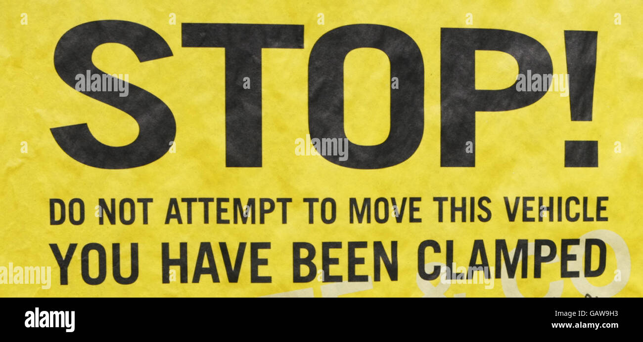 Stock image car incapacitated by wheel clamp hi-res stock photography ...