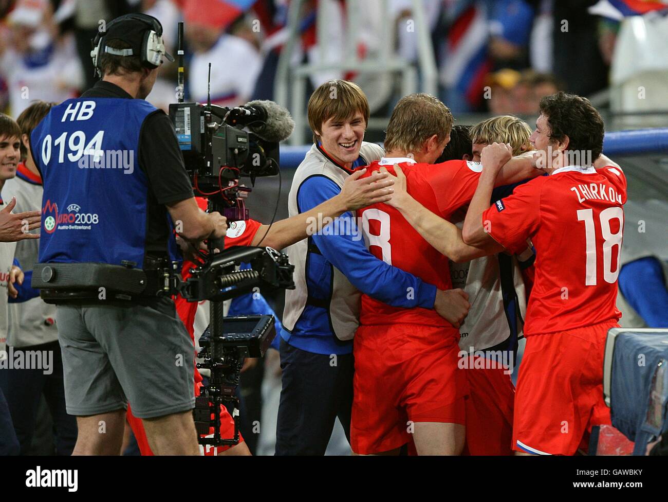 Russia's players celebrate on the touchline, after Roman Pavlyuchenko ...