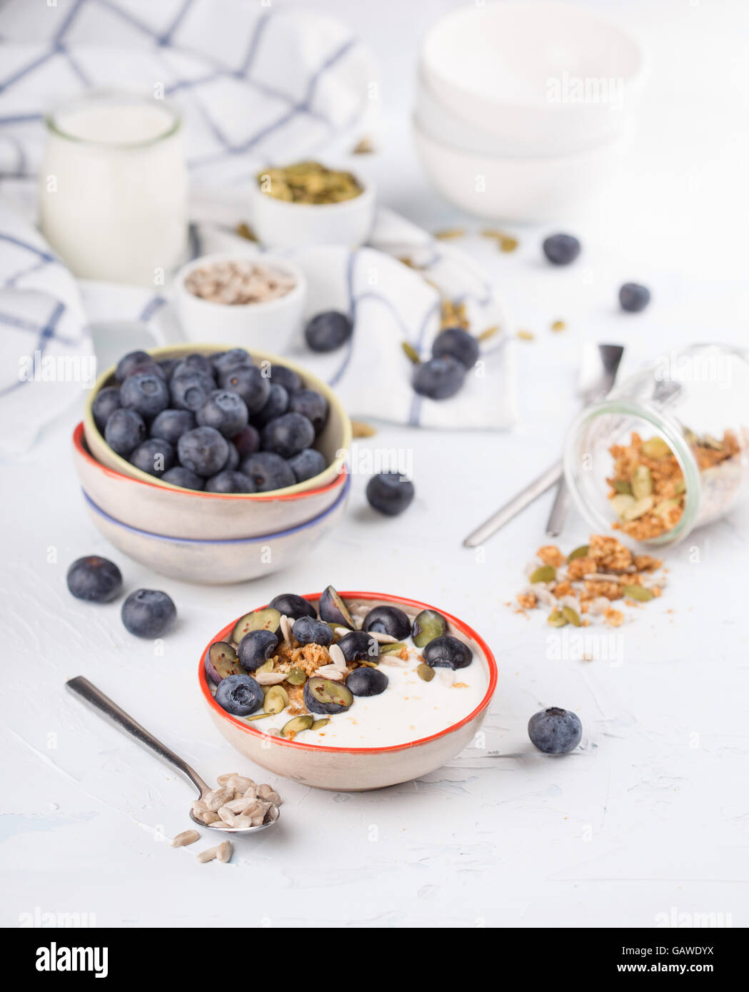Natural Greek yogurt served with assorted toppings Stock Photo - Alamy