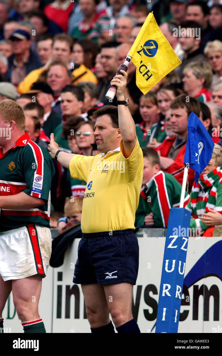 The touch judge raises his flag hi-res stock photography and images - Alamy