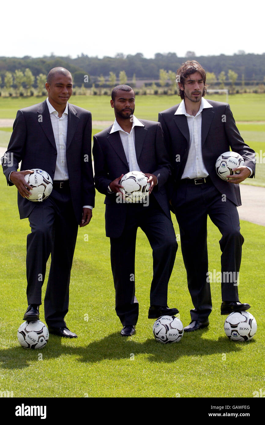 (L-R) Arsenal's Gilberto, Ashley Cole and Robert Pires show off the ...