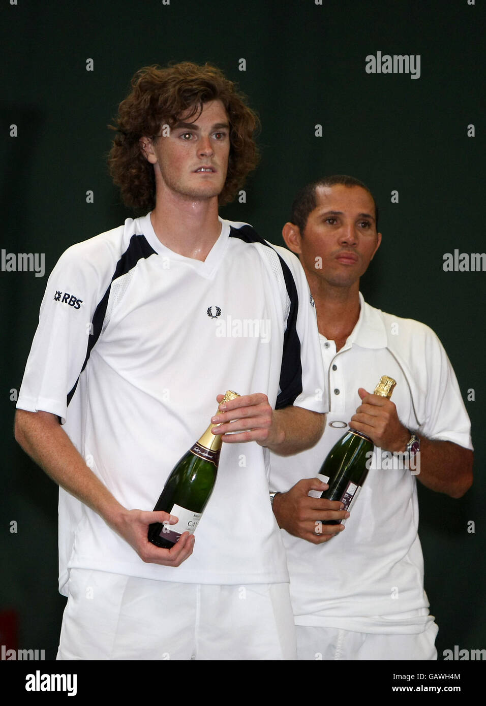 Great Britain's Jamie Murray and South Africa's Jeff Coetzee stand ...
