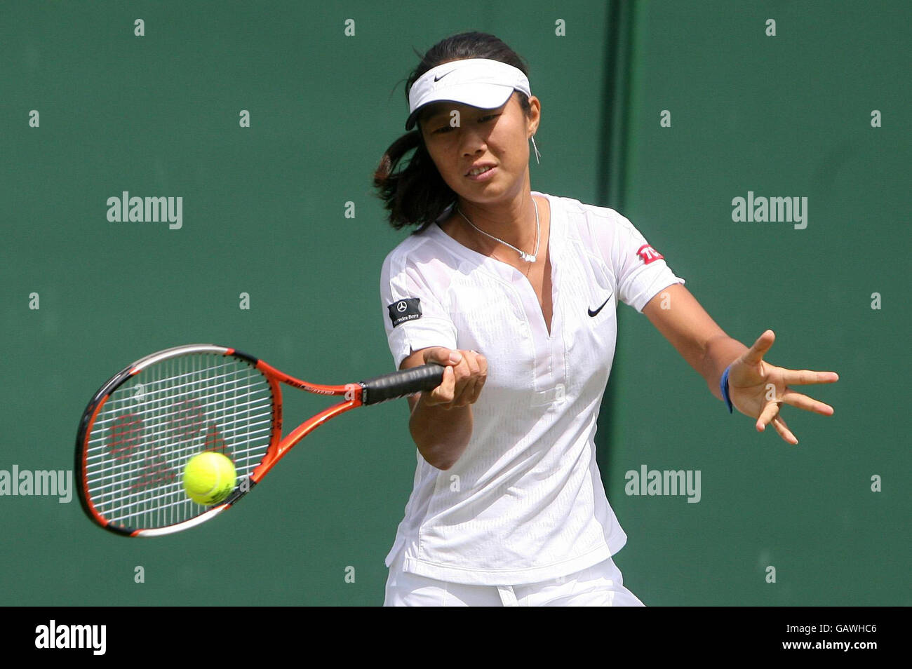 China's Tiantian Sun in action during The Wimbledon Championships at ...