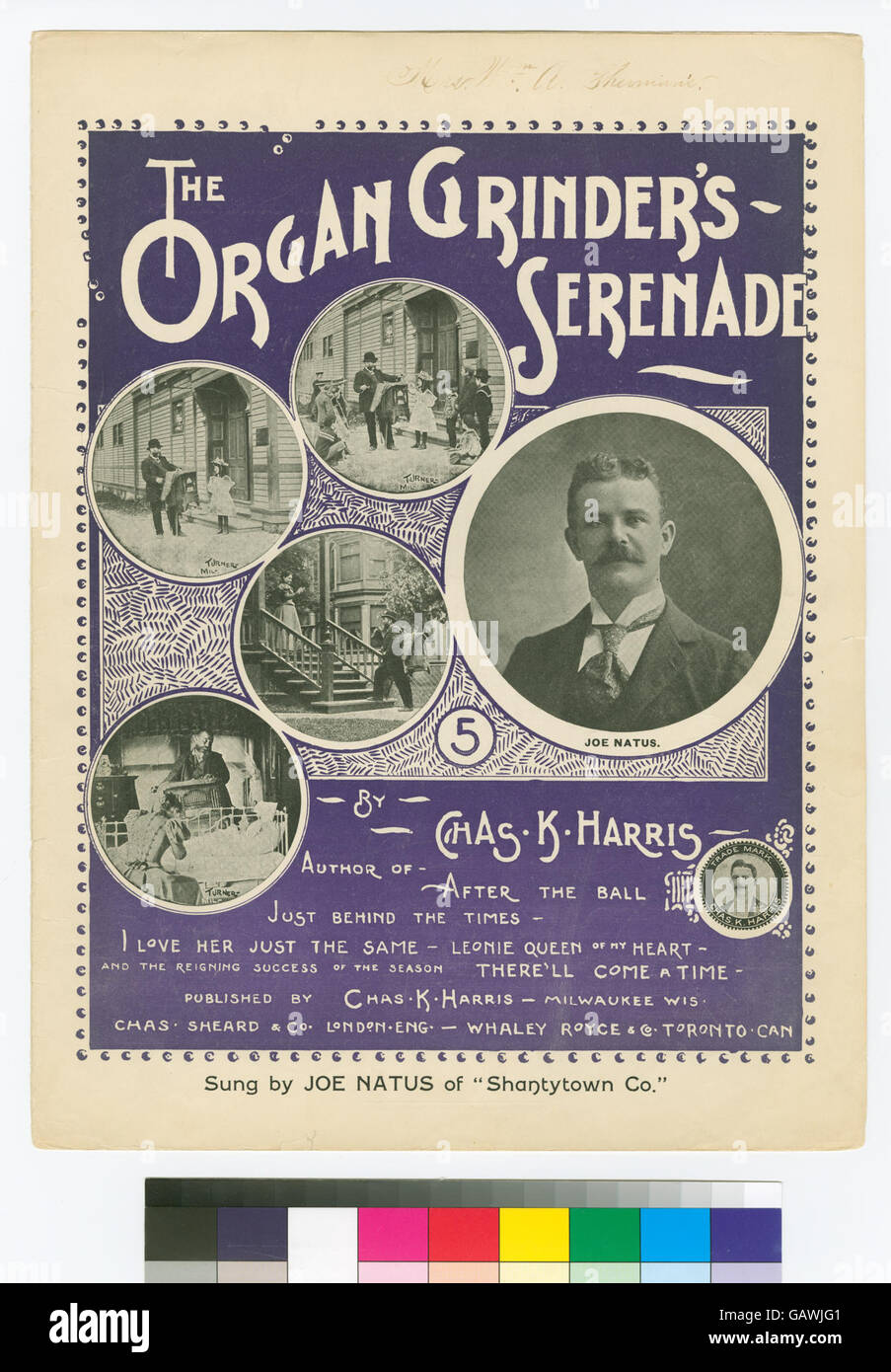 A photograph titled 'The Organ Grinder's Serenade', identified by code ...