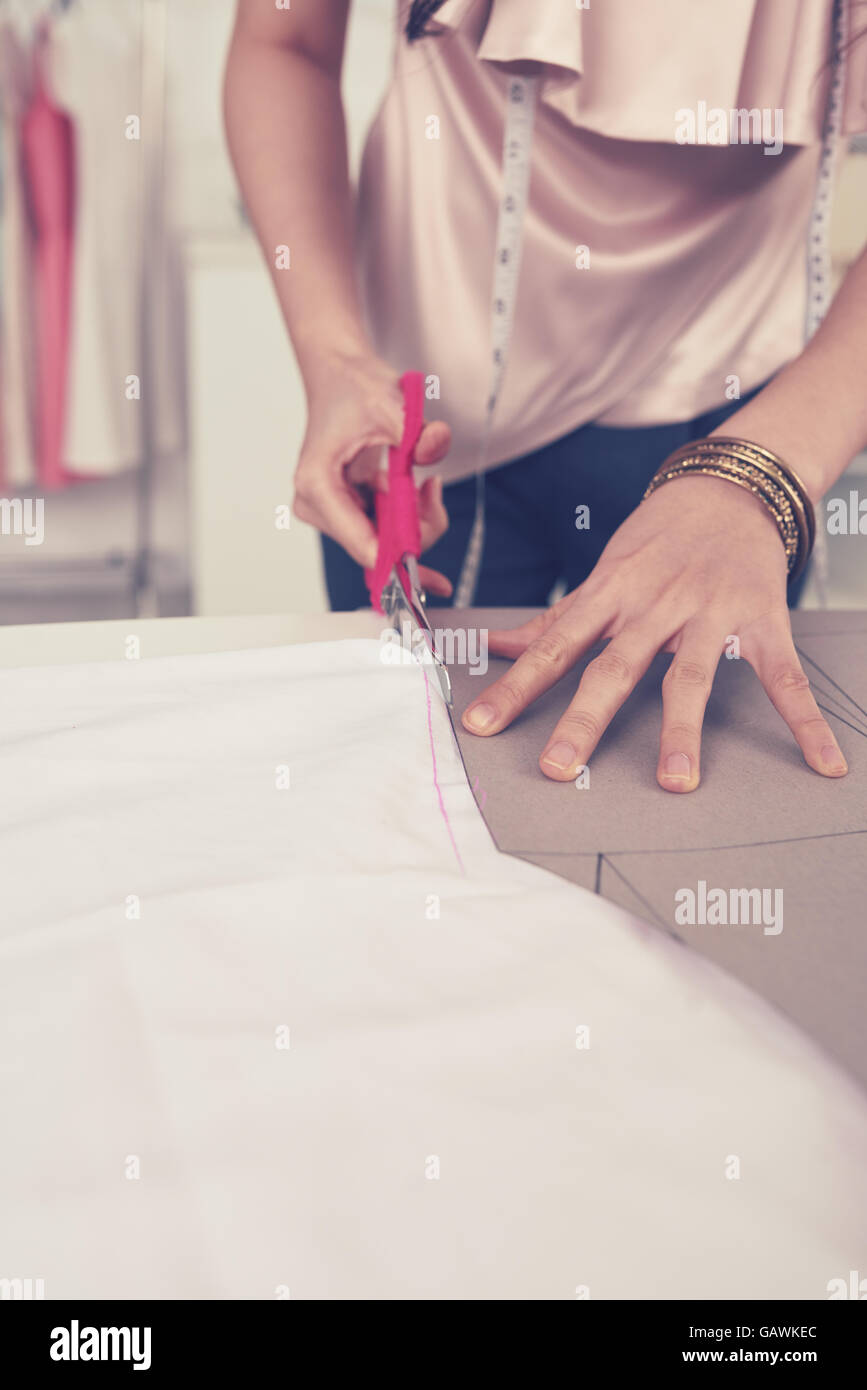 Cutting fabric hi-res stock photography and images - Alamy