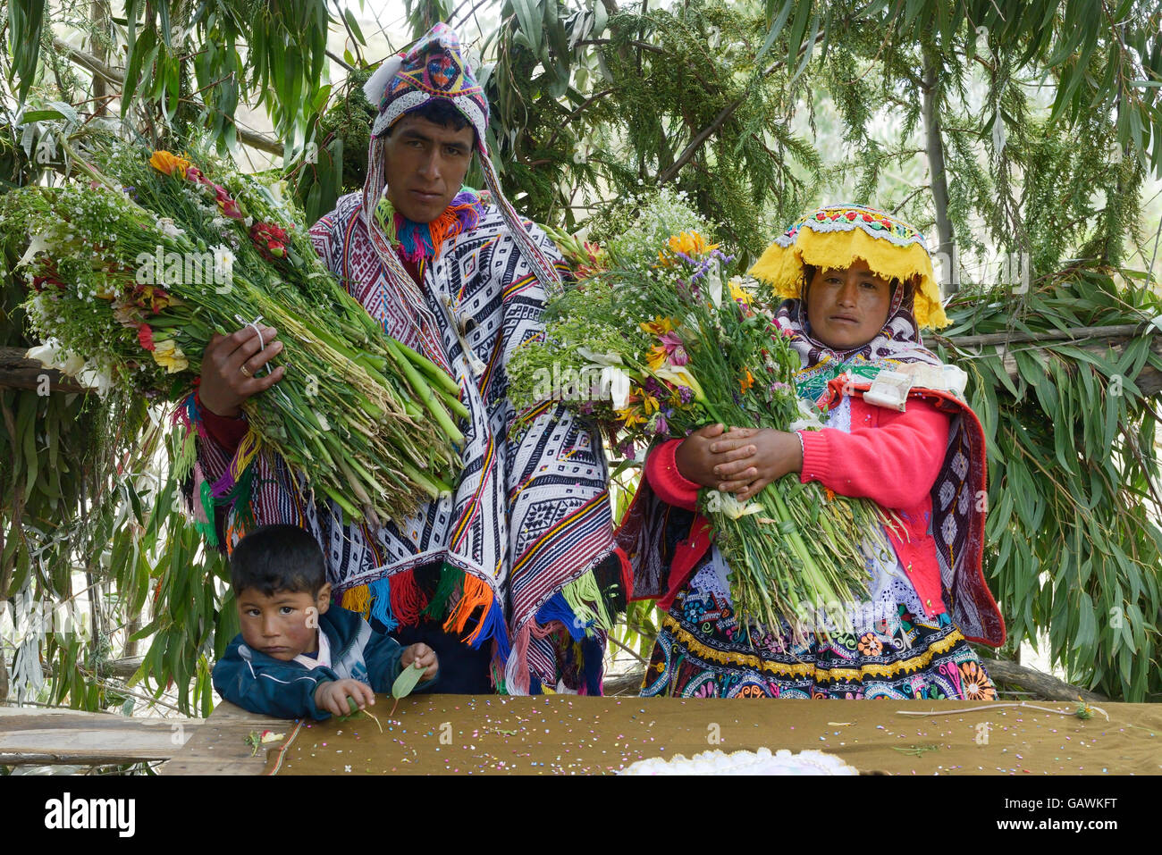 Ancient Andean wedding ceremony. View of a just married couple and one ...