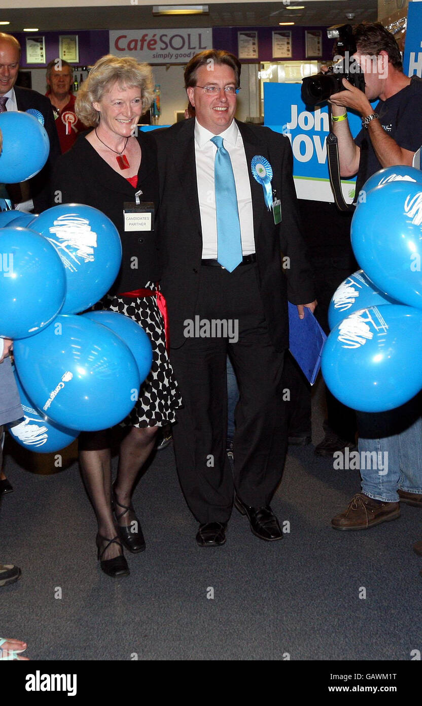 Conservative candidate John Howell and wife Alison arrive as ballot ...