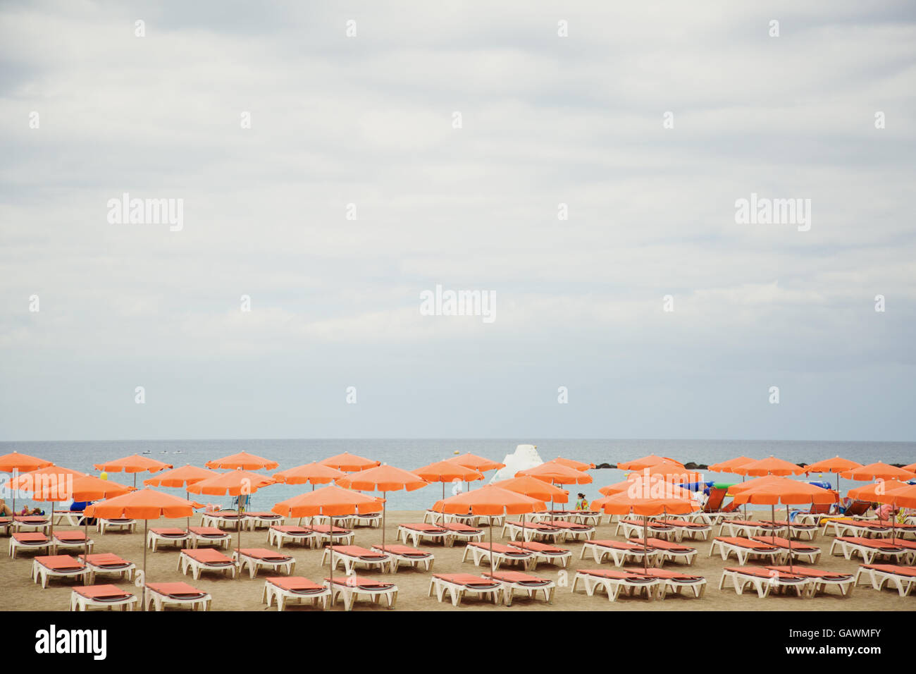 Beach for sunbathers Stock Photo - Alamy
