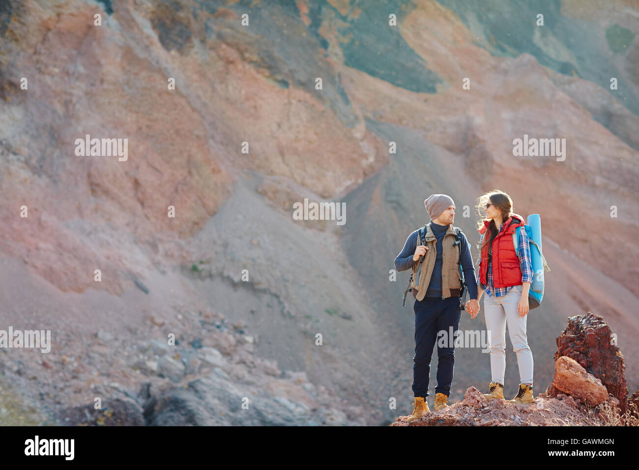 Standing on rock Stock Photo - Alamy