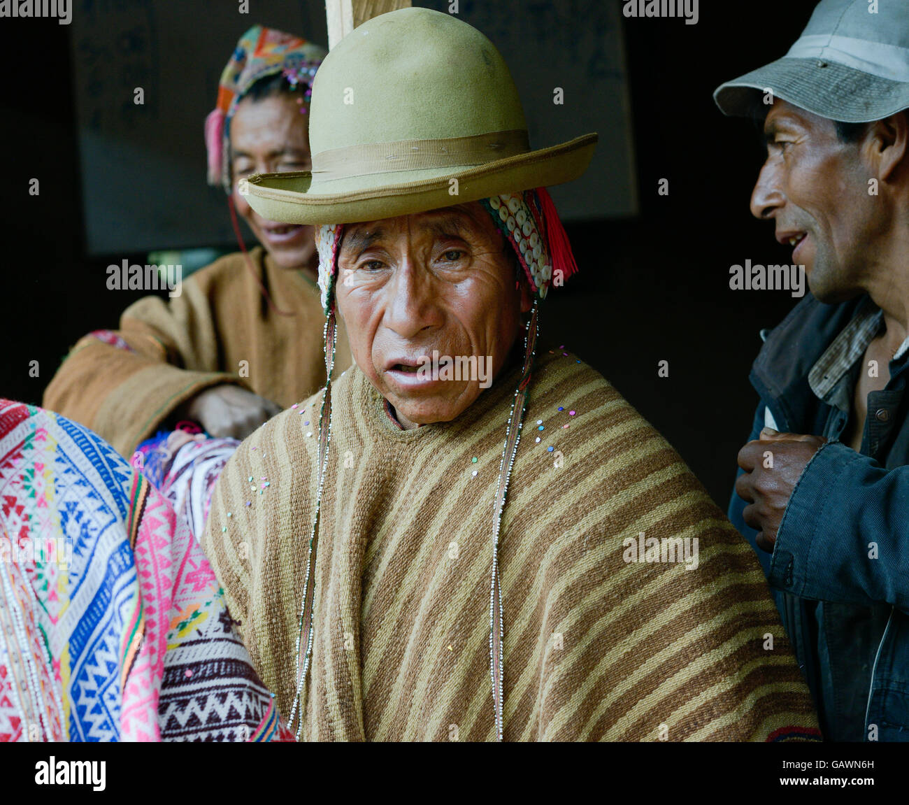 Portrait of a Native Peruvian man wearing typical andean robe, Paru ...