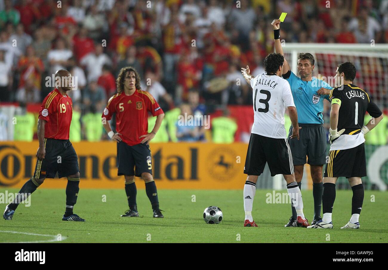 Germany's Michael Ballack is shown a yellow card by referee ROberto ...