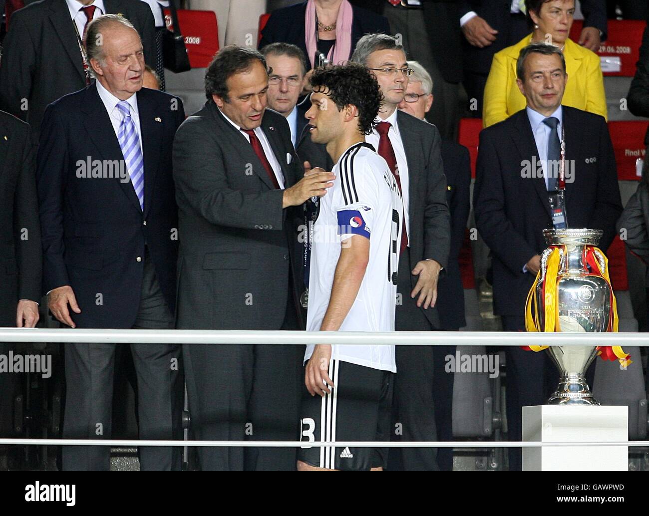 Germany's Michael Ballack receives his runners up medal from Michel ...
