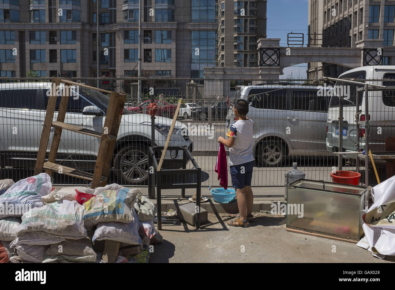 Beijing, China. 1st July, 2016. An urban-village that is located at the ...