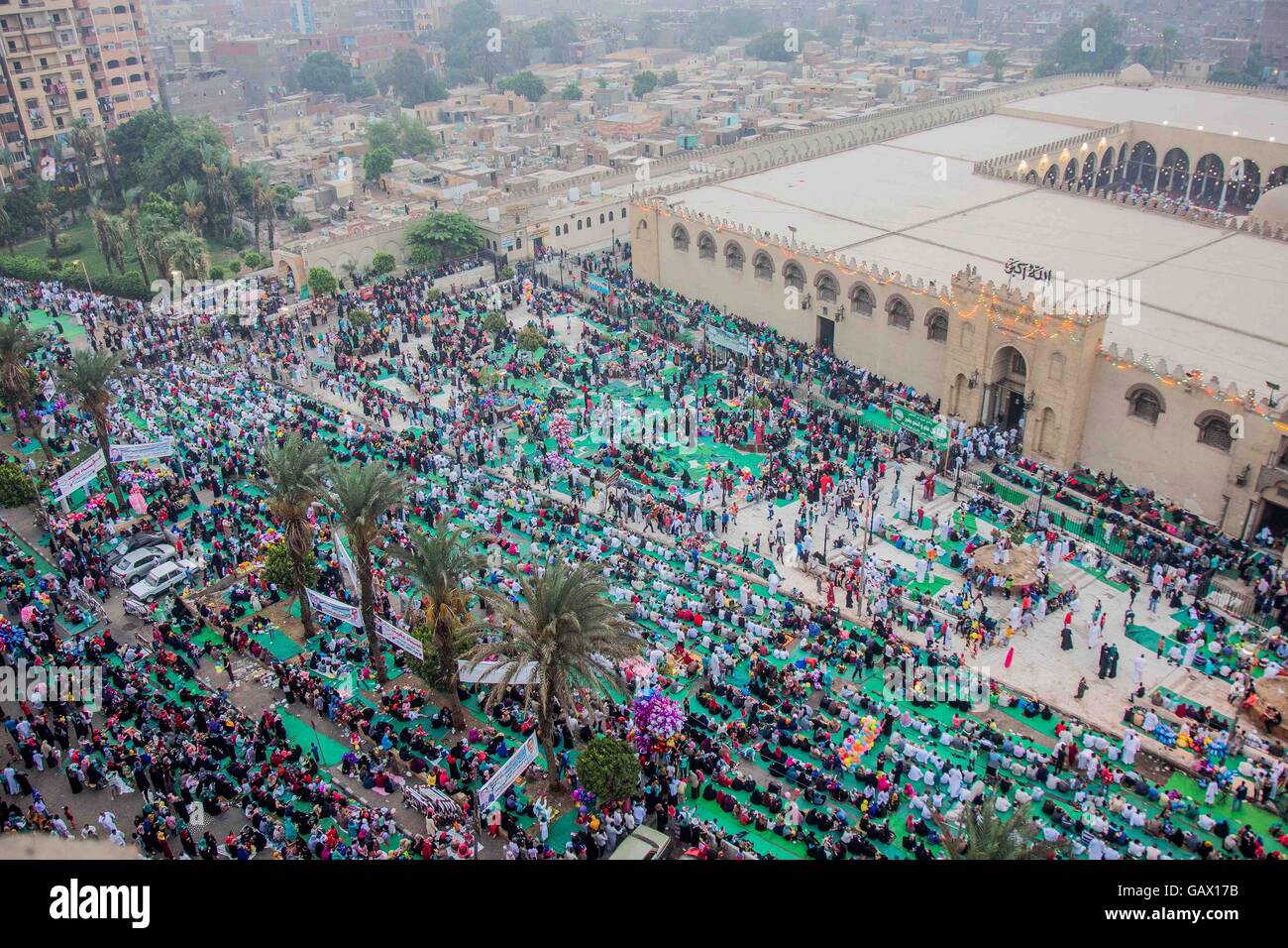 Cairo, Egypt. 6th July, 2016. Egyptian Muslims attend the morning ...