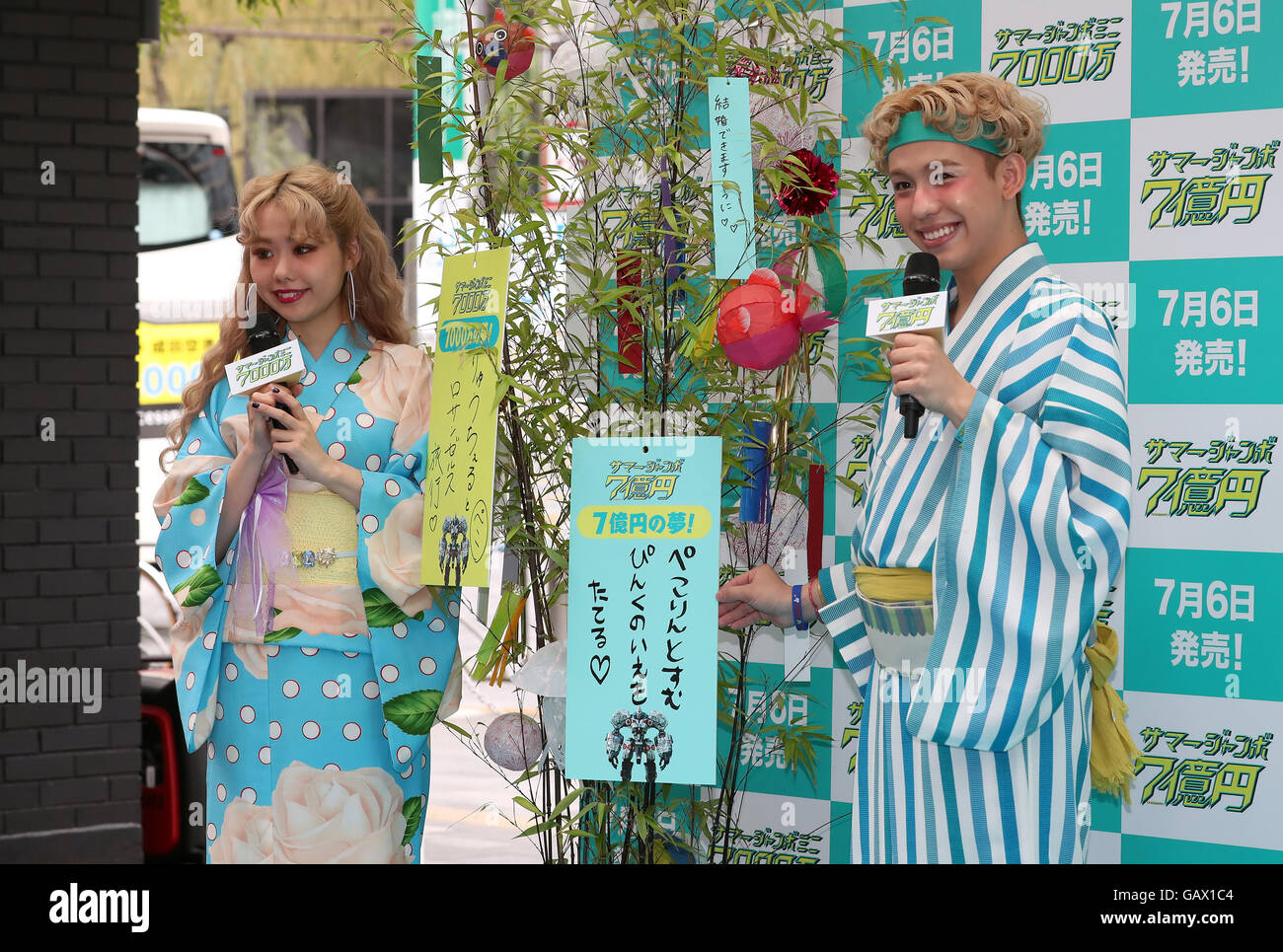 Tokyo, Japan. 6th July, 2016. Japanese models Peko (L) and Ryuchell (R) attend an event for the ...