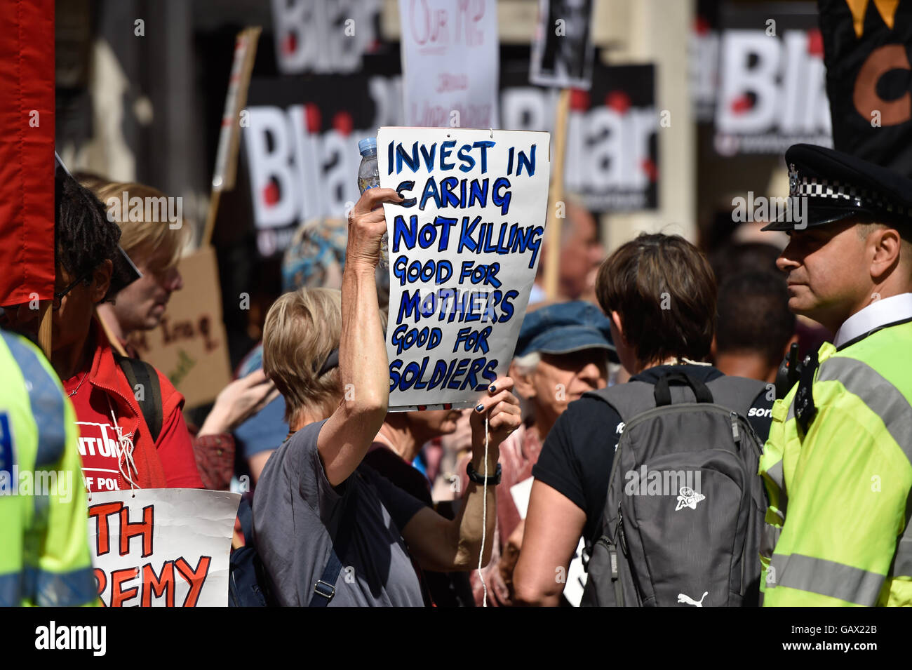 London, UK. 6th July, 2016. Protesters gather as Sir John Chilcott ...