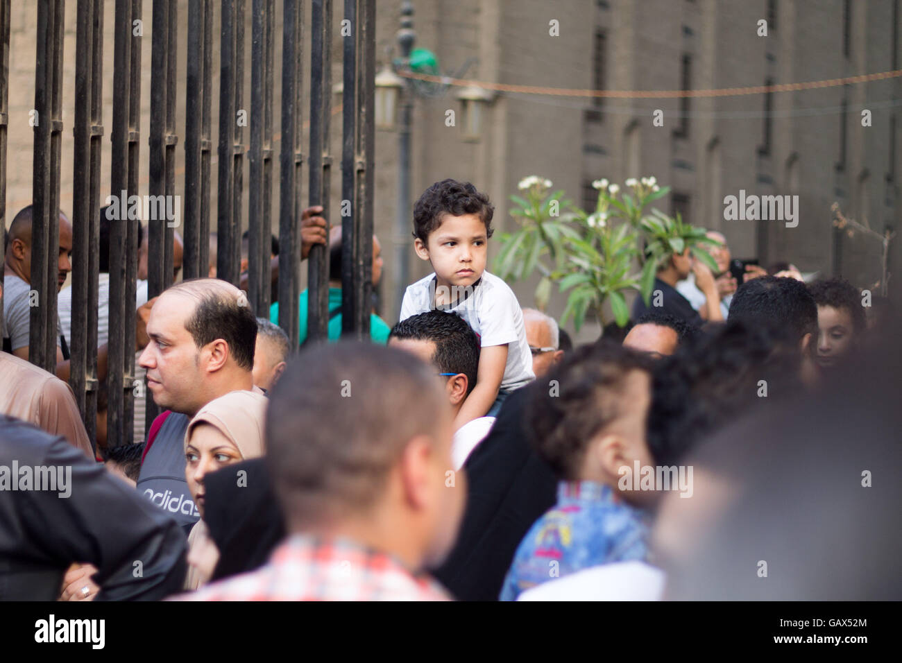 July 6, 2016 - Egypt - Father carrying his son on his shoulder after ...