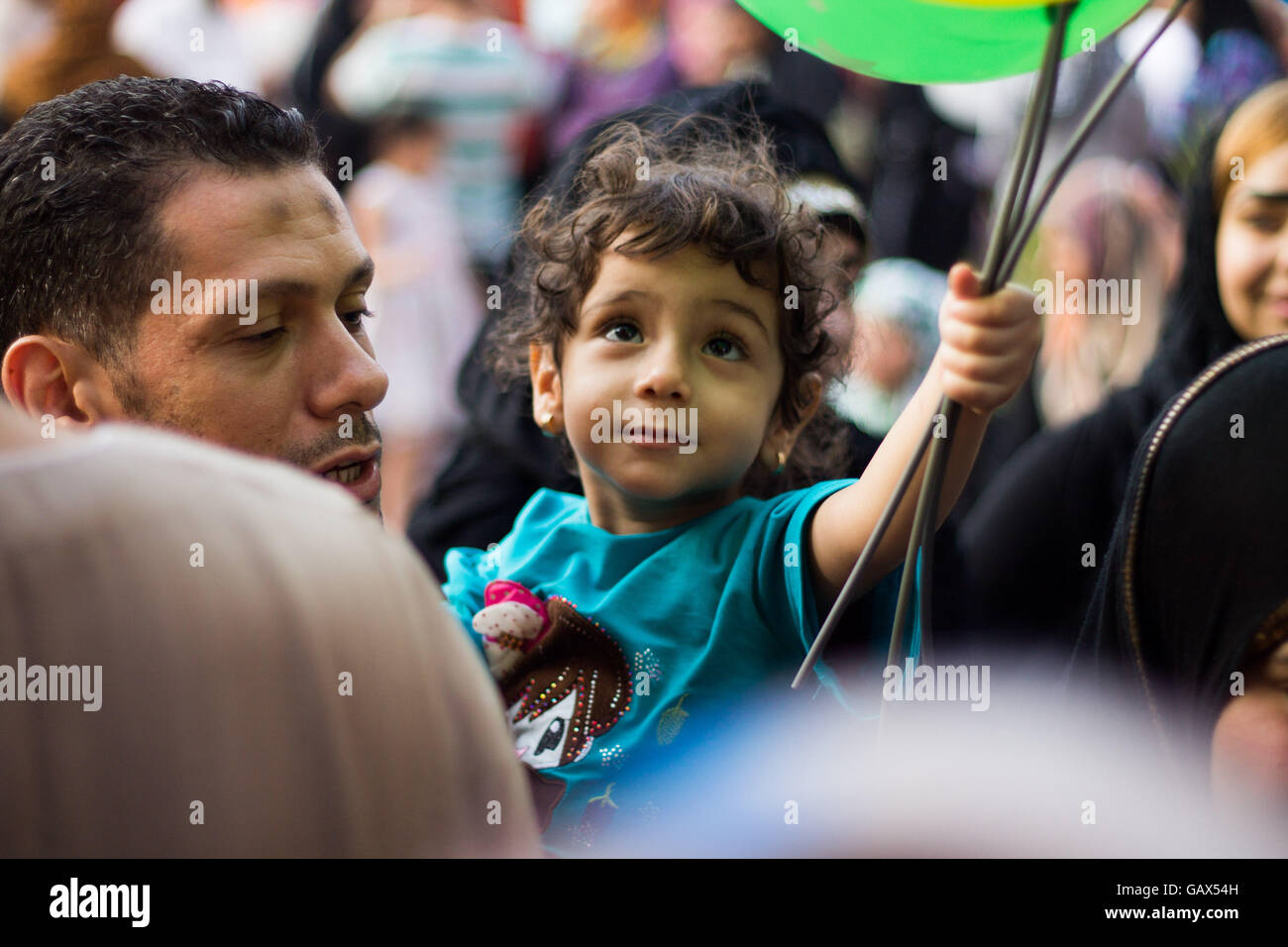 July 6, 2016 - Egypt - Father playing with his young girl after the Eid ...