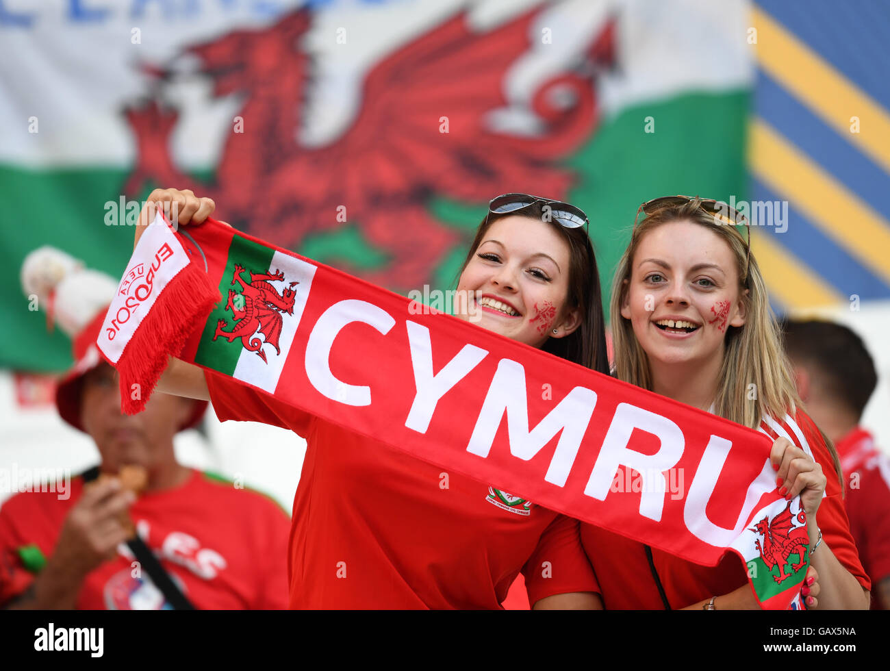 Supporters of Wales cheer in the stands before the UEFA EURO 2016 semi ...