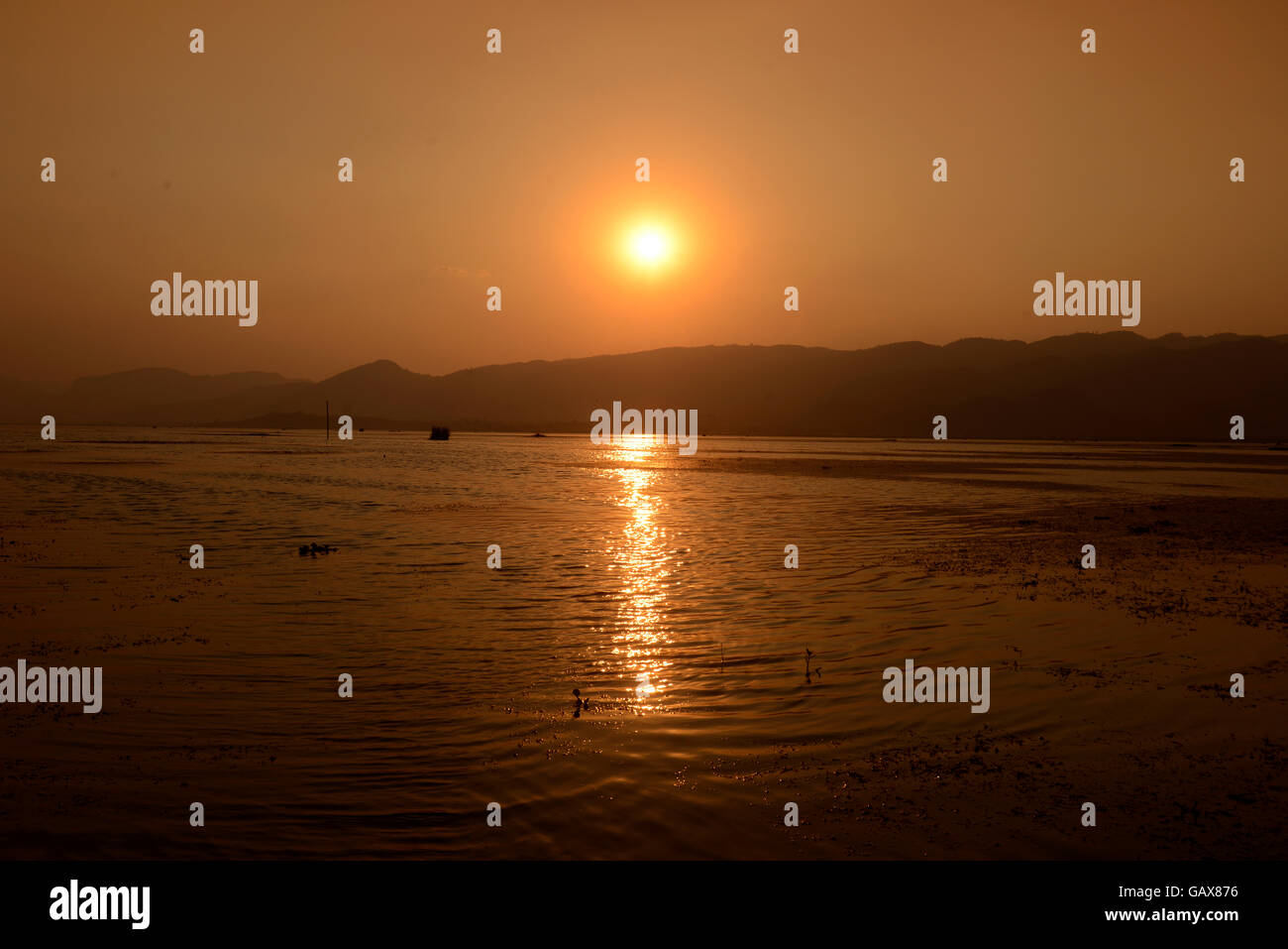 the Landscape at sunrise on the Inle Lake in the Shan State in the east ...