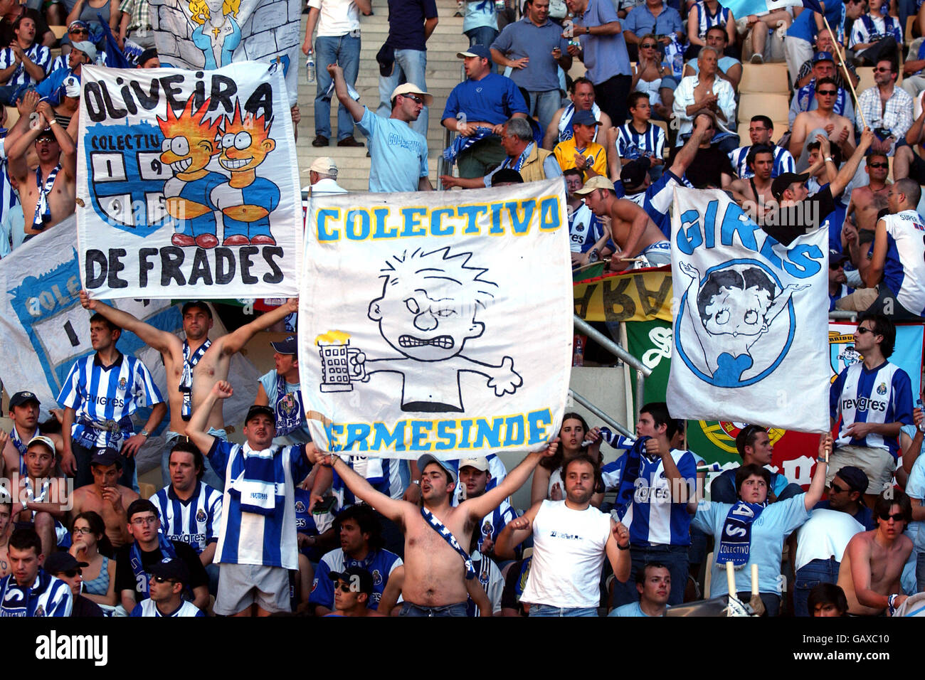 FC Porto fans cheer on their side at the Estadio Olimpico for the match ...