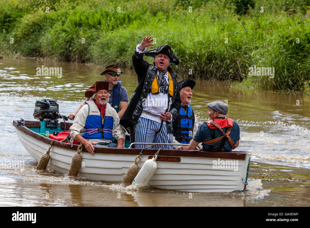 Local Men In Costume Take To The River Ouse In Small Boats During The ...