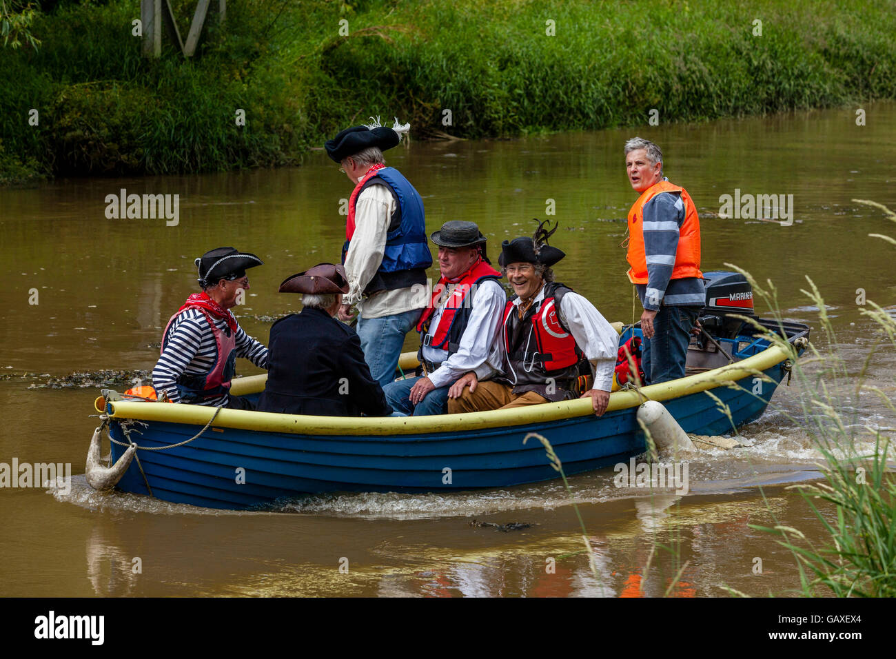 Local Men In Costume Take To The River Ouse In Small Boats During The ...