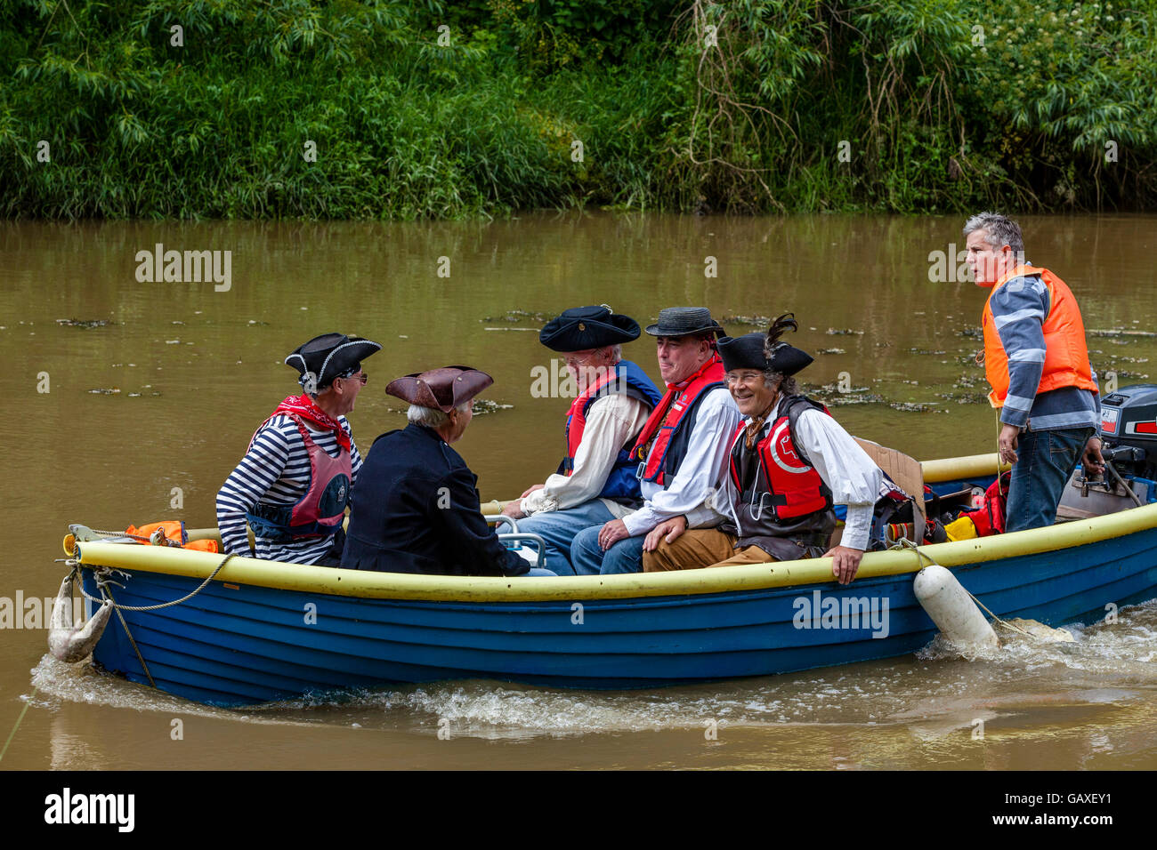 Local Men In Costume Take To The River Ouse In Small Boats During The ...