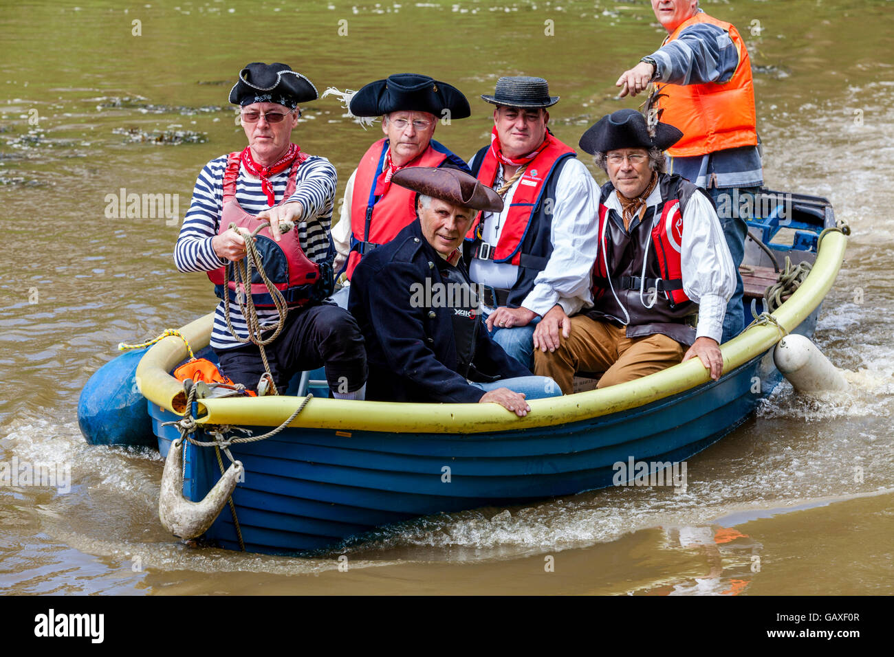 Local Men In Costume Take To The River Ouse In Small Boats During The ...