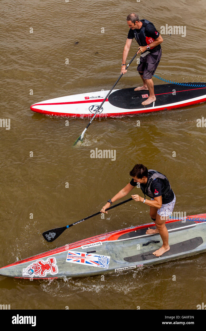 Woman stand up paddle boarding hi-res stock photography and images - Alamy