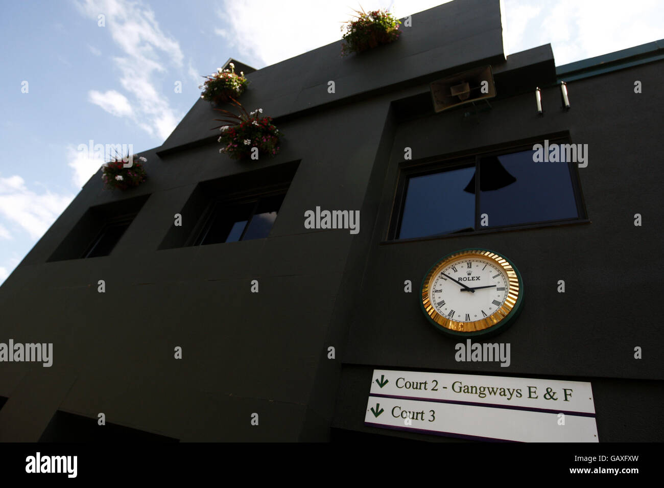 A view of a clock during the Wimbledon Championships 2008 at the All ...