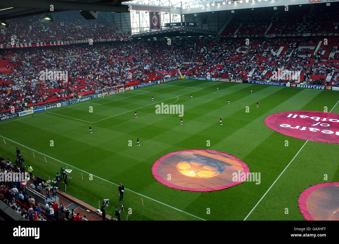 Champions league centre circle and ball boys hi-res stock photography ...