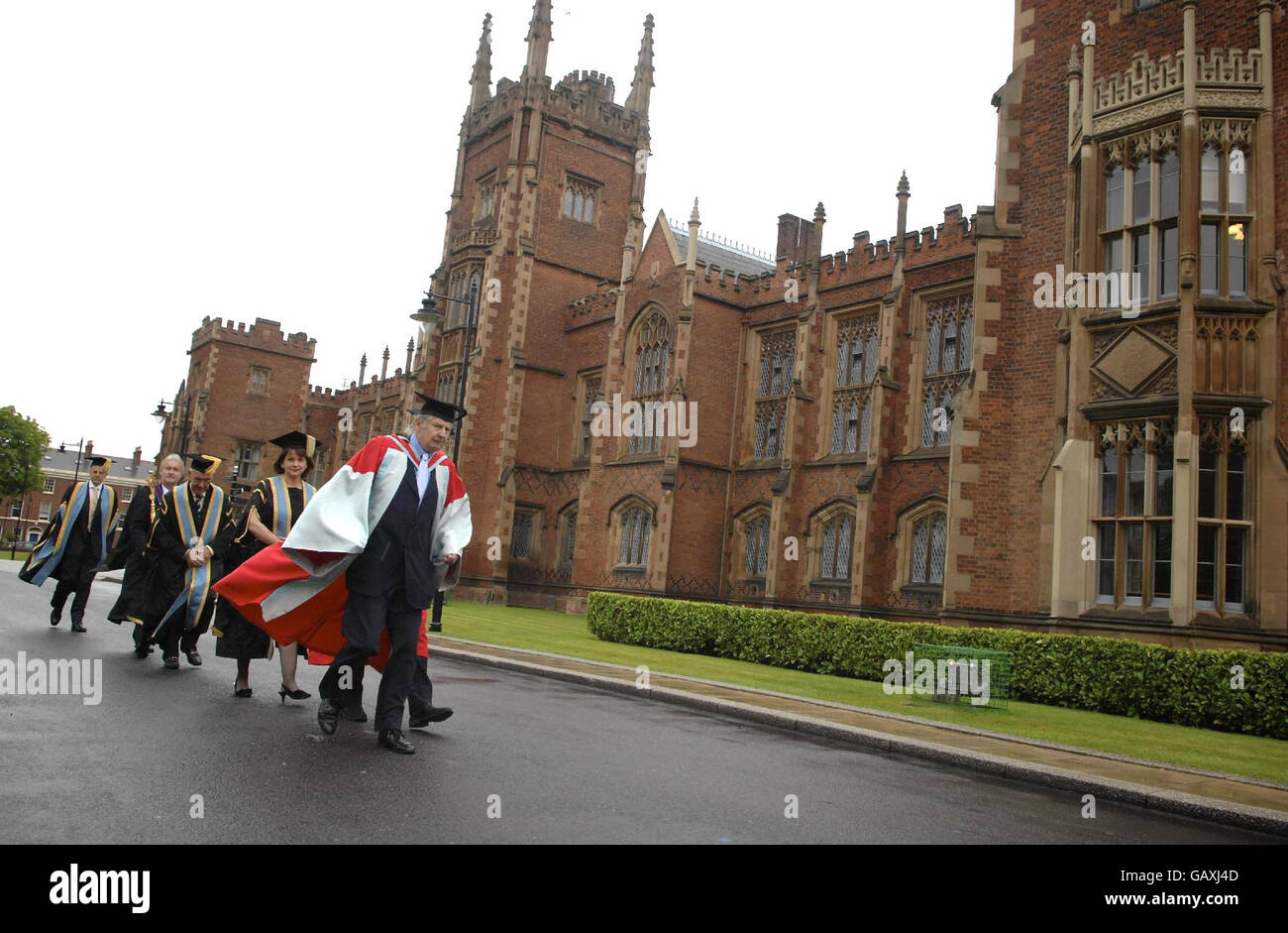 Actor Jimmy Ellis (front) with unknown persons, receives an honorary ...