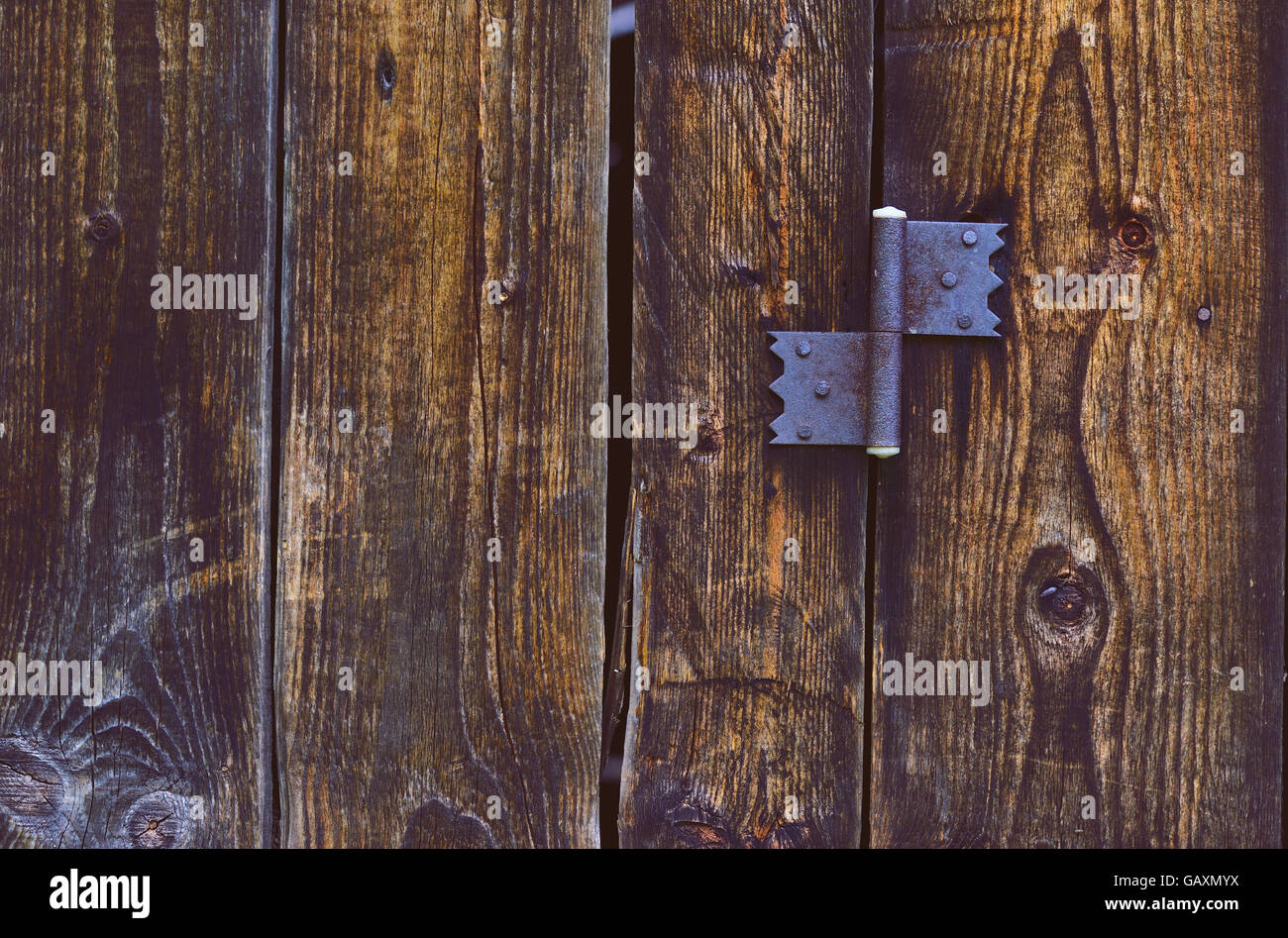 old rusty hinge on wooden door Stock Photo - Alamy