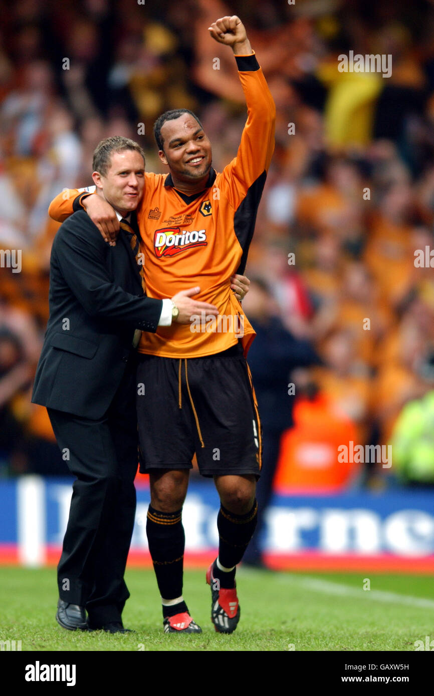 Wolverhampton Wanderers' Joleon Lescott (r) and Kevin Cooper celebrate ...