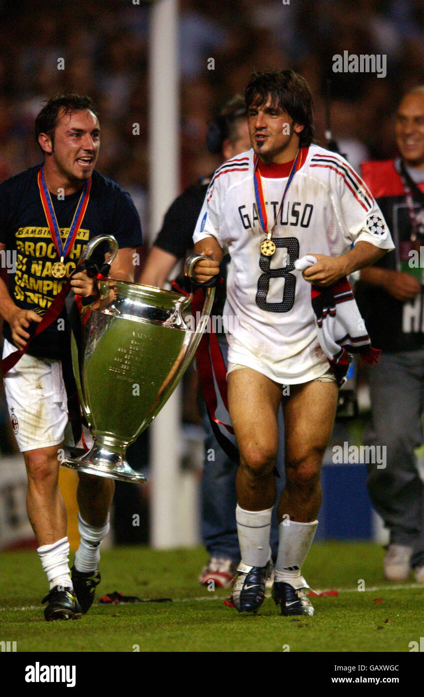 AC Milan's Cristian Brocchi and Gennero Gattuso celebrate with the UEFA ...